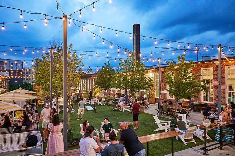 Optimist Hall’s Loyal Tenants Help Ring in Five Years - Black Wednesday